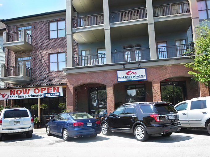Even the parking lot tells a story&mdash;"NOW OPEN" banner and waiting cars signaling that something worth discovering awaits inside.