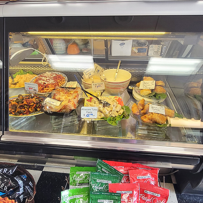 The deli case: where decisions become impossible and "I'll take one of everything" becomes a reasonable request. That pasta salad is calling your name.