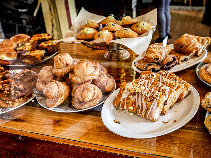 Pastry paradise awaits at the counter, where morning buns and glazed delights compete for your attention and affection.