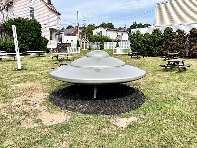 The town green offers picnic tables where visitors can contemplate interstellar travel while enjoying a very terrestrial lunch.