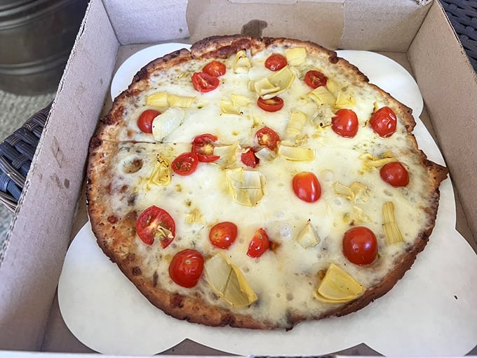 This artichoke and cherry tomato pizza might just convince even the most dedicated meat-lover to embrace vegetarian options occasionally.