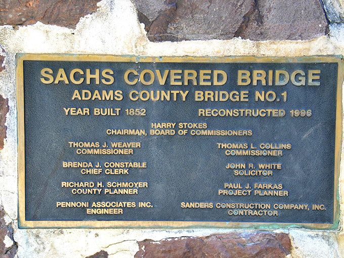 The official plaque commemorates the 1996 reconstruction. What it doesn't mention: the original craftsmanship was so good, many original elements remained intact.