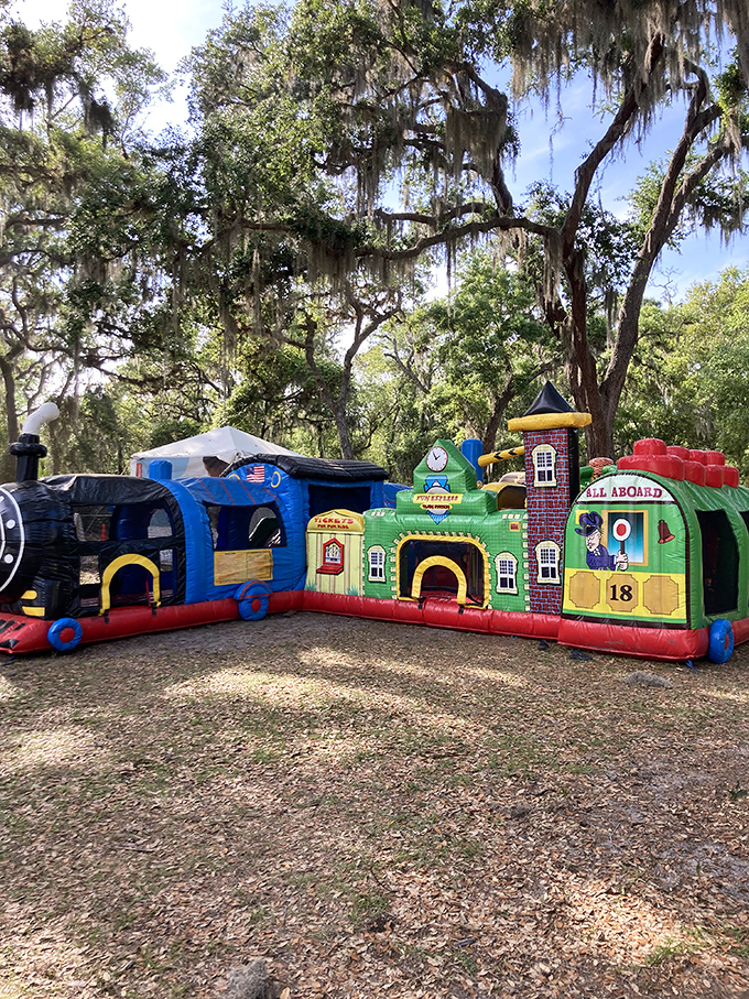 Even the youngest engineers can get in on the action with this train-themed bounce house nestled under Florida's magnificent oak canopy.