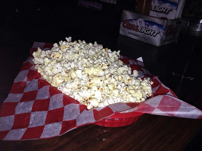 Free popcorn—the unsung hero of any great dive bar. Simple, salty perfection that keeps you just thirsty enough for another round.
