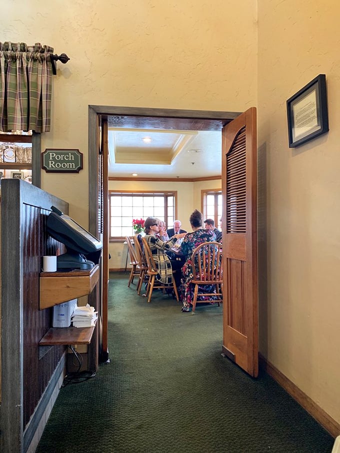 The "Porch Room" offers a quieter dining sanctuary where families gather to debate the merits of going back for thirds or saving room for pie.