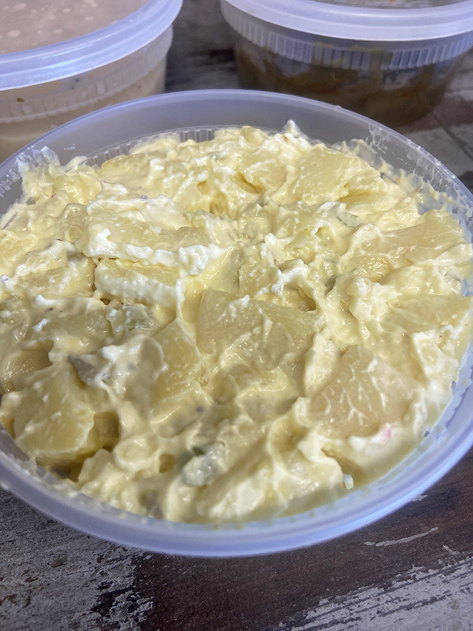 Potato salad that knows its role &ndash; cooling, creamy counterpoint to barbecue's intensity. Every great pitmaster knows balance is everything.