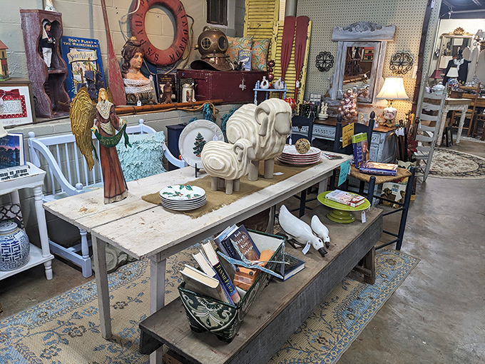 Nautical treasures and carved sheep create an unexpected maritime-meets-farmhouse vibe. The vintage diving helmet has seen depths most of us only dream about.