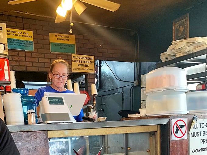 The ordering counter—that magical threshold where barbecue dreams begin and diet plans go to die, gloriously.