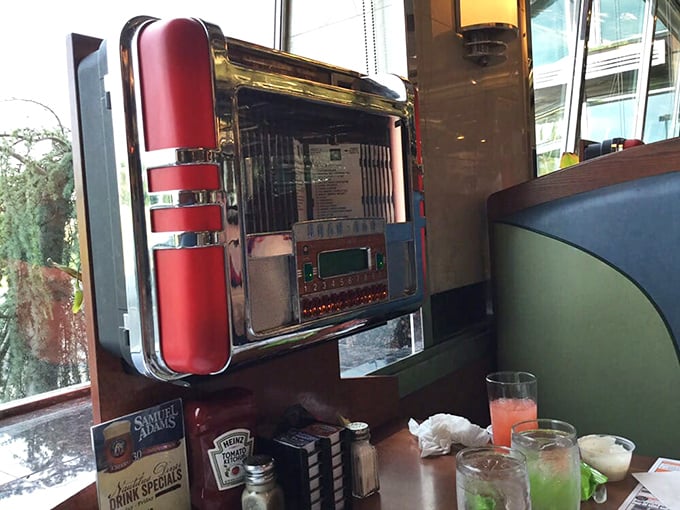 The tabletop jukebox whispers of simpler times when three songs for a quarter was all the entertainment technology we needed.