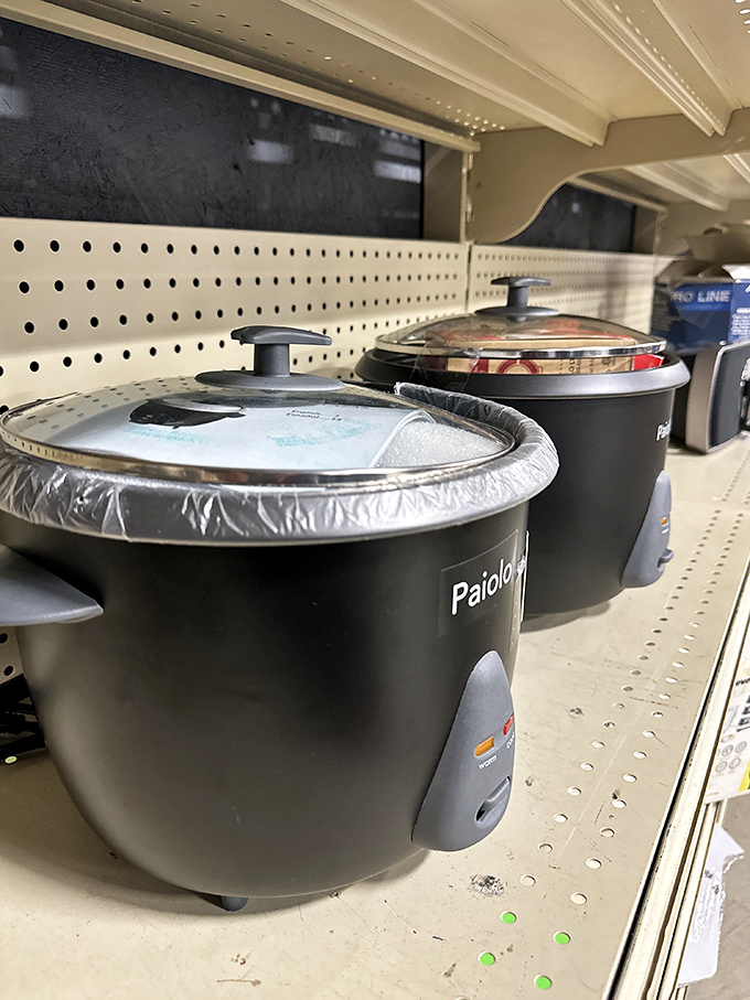Rice cookers standing at attention, ready for their next kitchen adventure. One appliance's retirement becomes another home's new beginning.