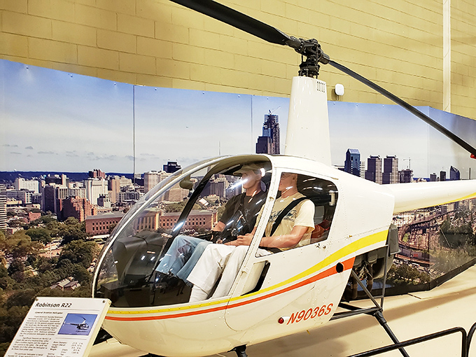 Visitors can experience the thrill of simulated flight in this Robinson R22, complete with city backdrop. Just don't pull the collective lever too hard!