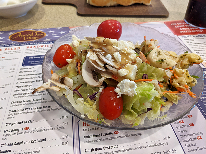 Even the salad feels special here, with crisp lettuce, cherry tomatoes, and house-made dressing that makes eating vegetables feel less like a chore.