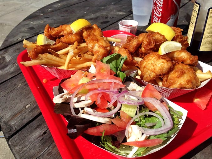 A fresh salad offering a crisp counterpoint to fried delights&mdash;like bringing a responsible friend to balance out your more indulgent companions.