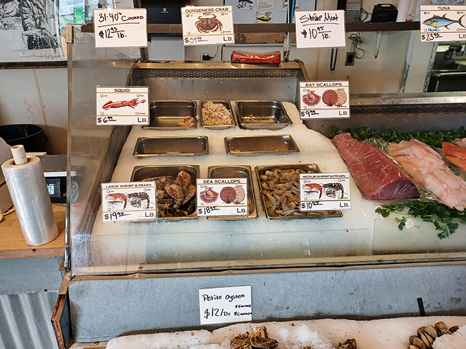 The seafood display case &ndash; where the day's catch waits patiently, making eye contact and silently suggesting, "Pick me, I'm the freshest one here."