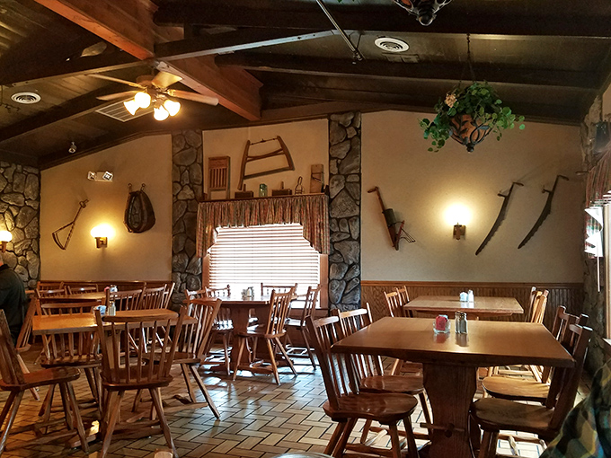 The dining room feels like your favorite aunt's place, if your aunt collected antique farm tools and knew how to perfectly space tables.