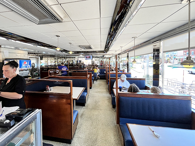 Down the center aisle, every booth tells a different story&mdash;some celebrating birthdays, others just celebrating Tuesday.