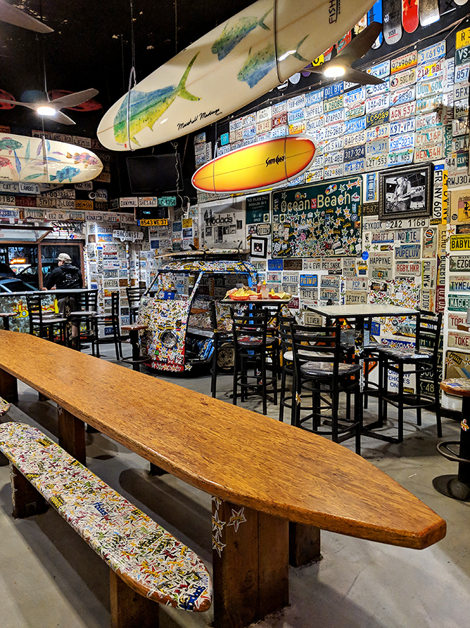 Surfboard tables and license plate decor create the perfect backdrop for the serious business of burger consumption. California dining at its finest.