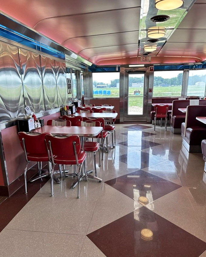 The diner's interior gleams with nostalgia and possibility. Those red chairs have heard decades of stories and held countless satisfied diners.