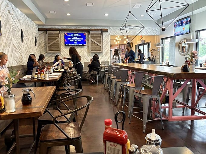The dining room buzzes with conversation and clinking forks. Notice how nobody's looking at their phones? That's the power of good food.