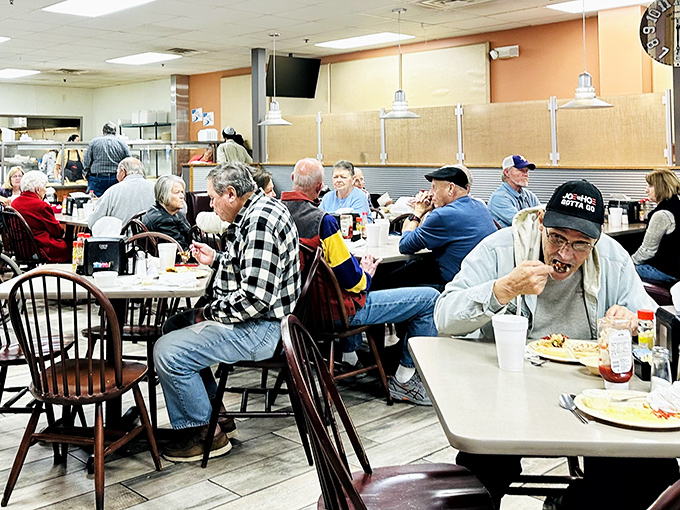 The breakfast club in session. These wooden chairs have supported generations of locals sharing news, weather reports, and fishing stories.