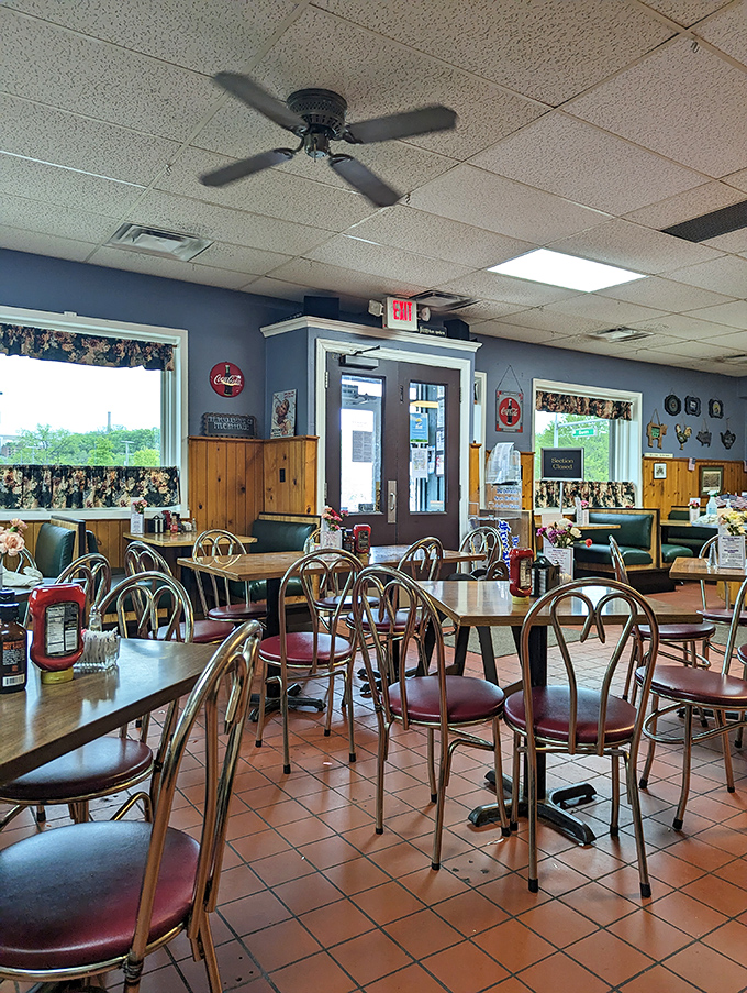 Empty chairs waiting for the breakfast rush—a calm before the storm of coffee pours, order calls, and the symphony of forks against plates.