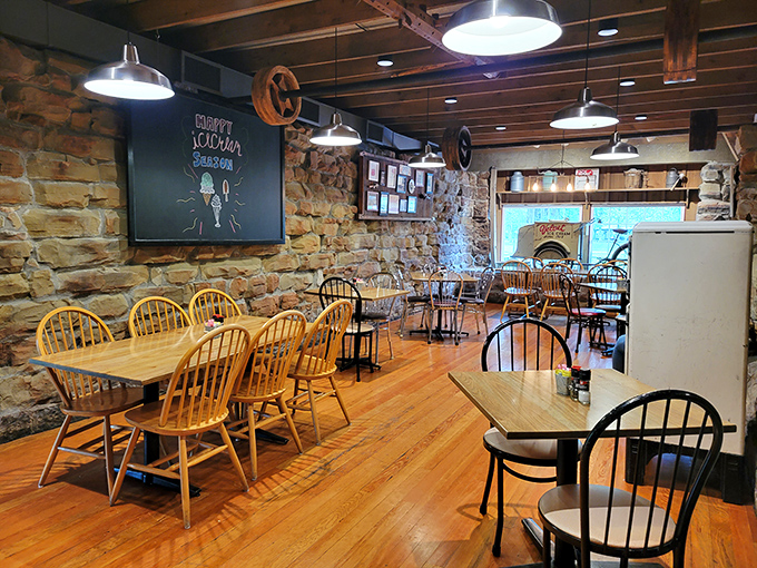 Stone walls and wooden chairs create the perfect backdrop for ice cream contemplation. Calories don't count in buildings this historic.