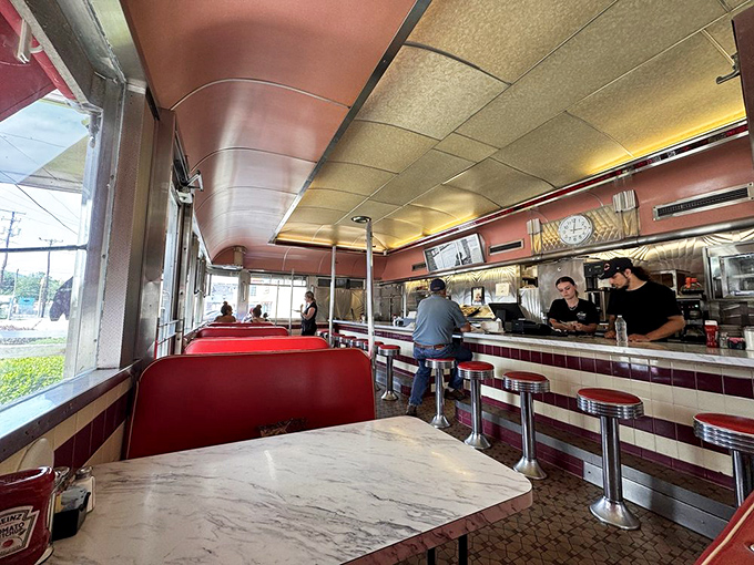 The diner's interior whispers stories of countless conversations, first dates, and regulars who've claimed these booths as second living rooms.