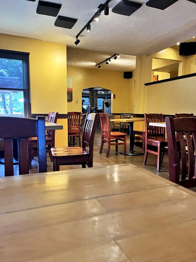 The dining room where food dreams come true. Simple wooden chairs invite you to sit and stay awhile—they know what's coming from the kitchen.