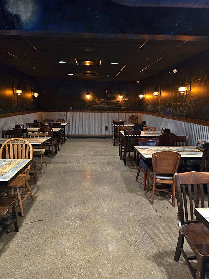 The dining room's moody lighting and nautical murals create the perfect backdrop for the serious business of BBQ appreciation.