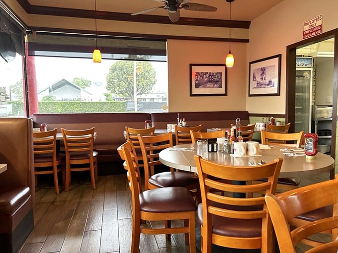 Booths for families, tables for friends, and enough warm wood tones to make you feel like you're dining in someone's well-loved kitchen.