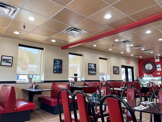 The dining room says "we care about your comfort, not your Instagram feed." Those red booths have supported more happy meals than McDonald's.