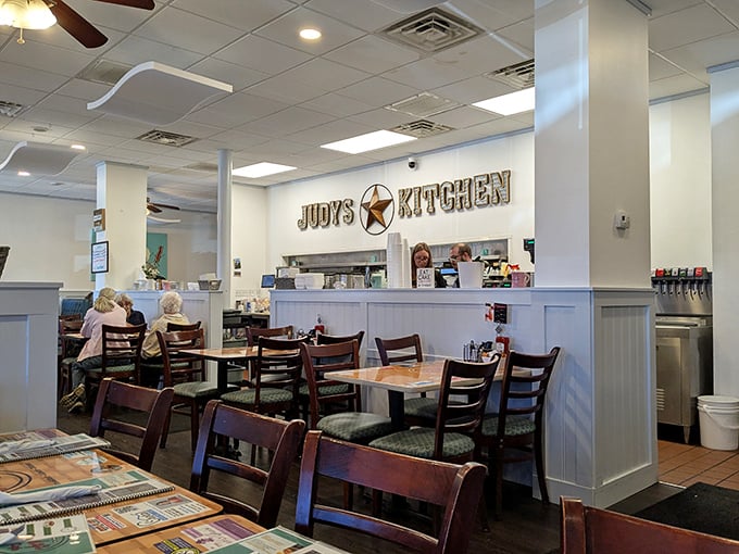 The "Judy's Kitchen" sign watches over diners like a friendly reminder that you're not just in a restaurant&mdash;you're in someone's culinary home.