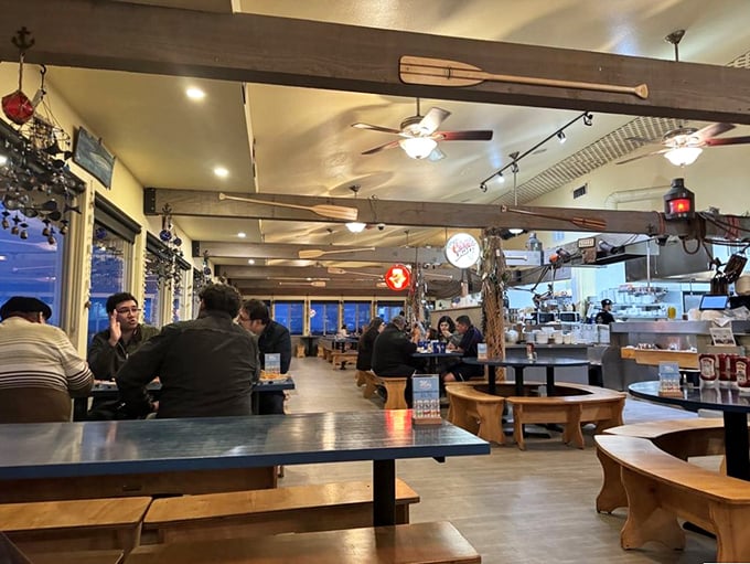The dining room's wooden beams and casual seating create that rare atmosphere where both special occasions and Tuesday lunch feel equally at home.