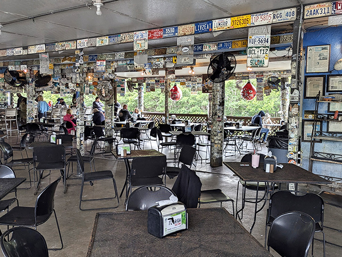 The dining room where conversations flow as freely as the breeze. Every license plate represents someone who once sat right where you are.