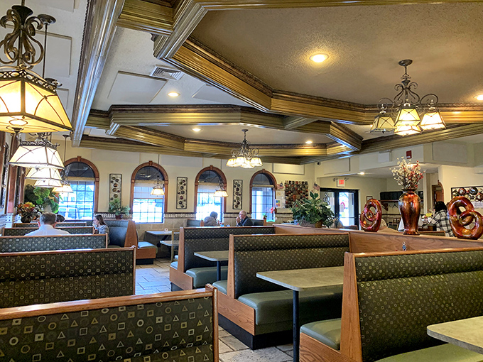 Booths designed for lingering conversations and food comas. The lighting says "stay awhile" while your belt whispers "maybe we should go."