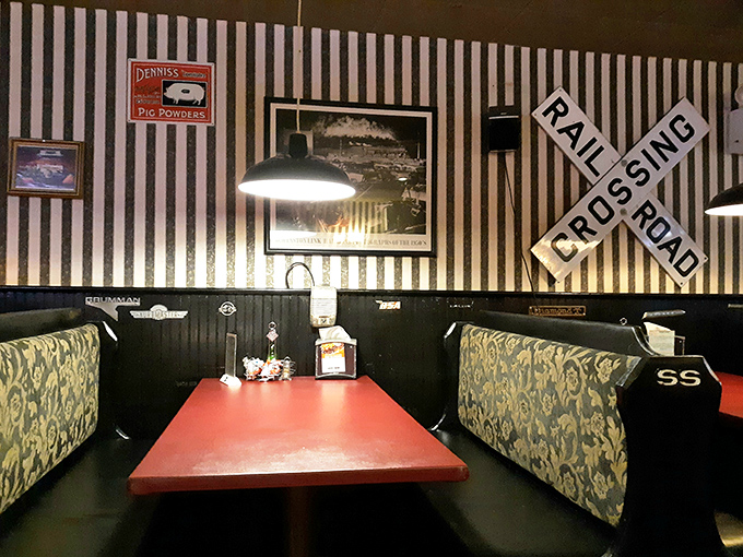 Booth seating that invites you to settle in for the long haul, surrounded by roadhouse memorabilia that tells stories without saying a word.