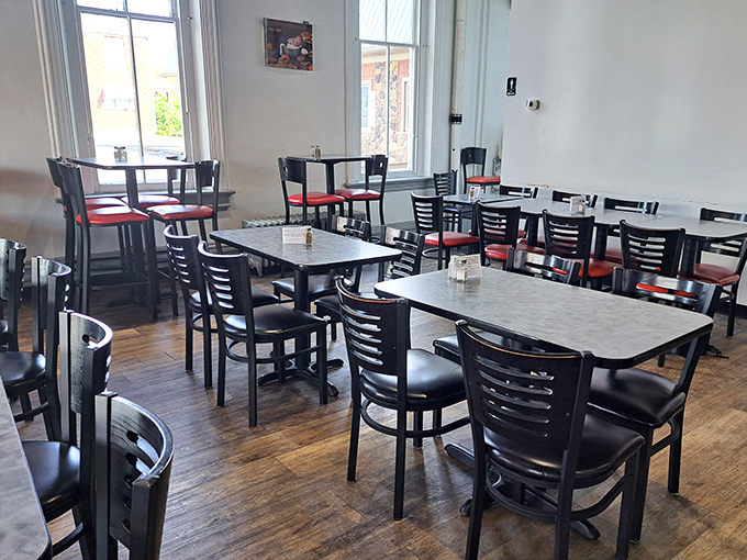 Classic diner seating with a touch of elegance—where strangers become friends over shared appreciation of exceptional pancakes.