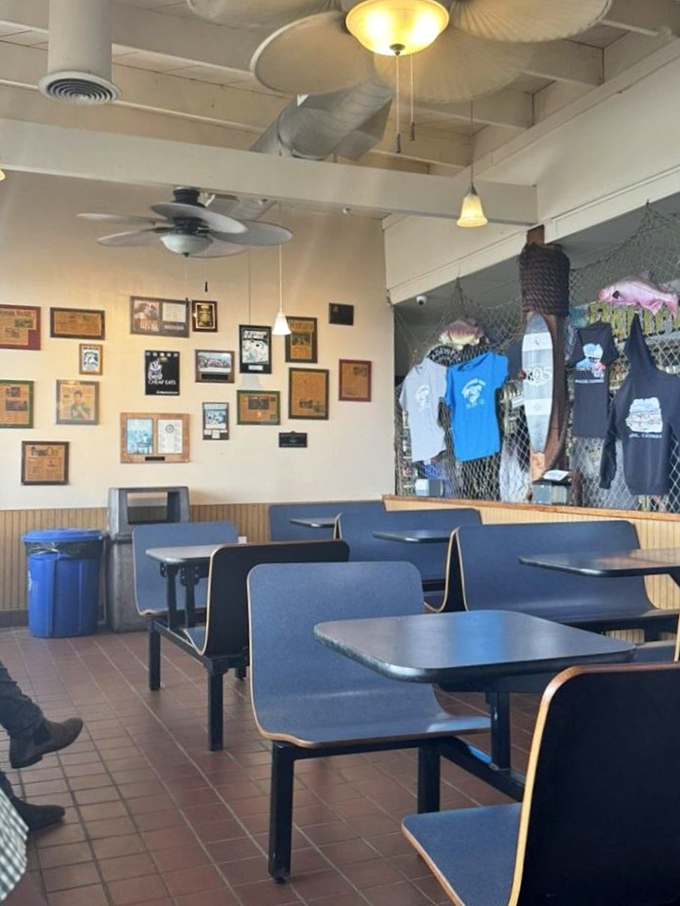 Blue booths that have supported countless seafood enthusiasts, while walls showcase decades of Neptune's Net memories.