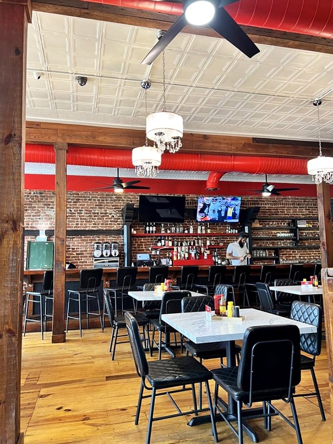 The dining room strikes that perfect balance between "nice enough for a celebration" and "comfortable enough to lick your plate when no one's looking."