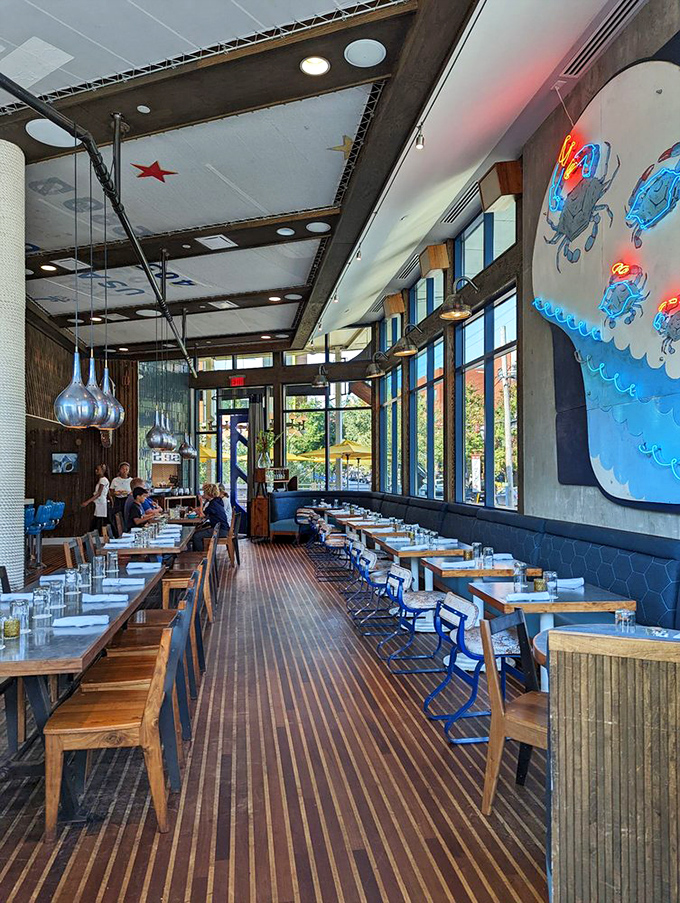 The dining room's nautical-chic design features porthole-like windows and maritime art that transports you seaside without the sunburn or sand in your shoes.