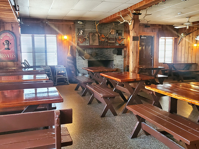 The dining room feels like your grandfather's fishing cabin, where mounted catches and wood-paneled walls tell stories of Florida's maritime past.