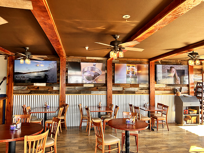 Rustic meets refined in this dining space where wooden beams and corrugated metal create the perfect backdrop for seafood storytelling.