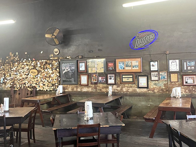 The dining area where barbecue dreams come true. Those business cards on the wall represent thousands of satisfied customers.