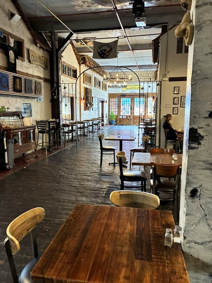 The dining room whispers stories of countless conversations over great meals. Those worn wooden tables have hosted more food epiphanies than most therapists.