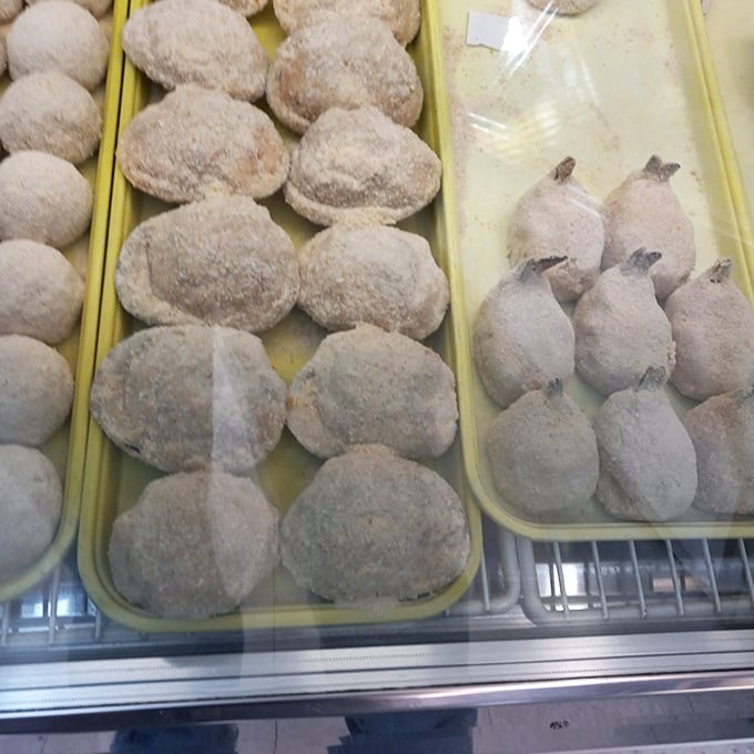 These breaded treasures waiting to meet the fryer will soon transform into golden-brown delights. Patience is a virtue that pays delicious dividends.