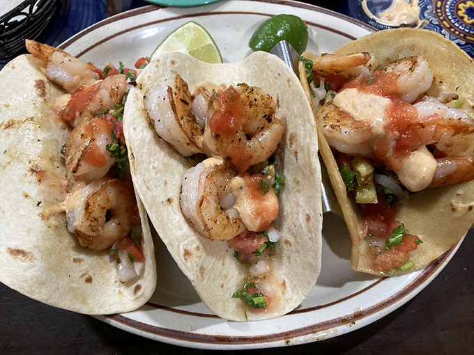 Shrimp tacos that could make a pescatarian weep with joy. The perfect trio of tortilla, seafood, and toppings that makes sharing a moral dilemma.