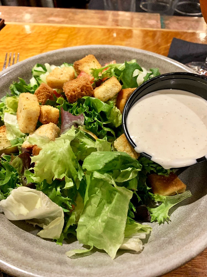 Even the side salad gets the star treatment here. Those perfectly golden croutons aren't phoning it in&mdash;they're auditioning for the lead role.