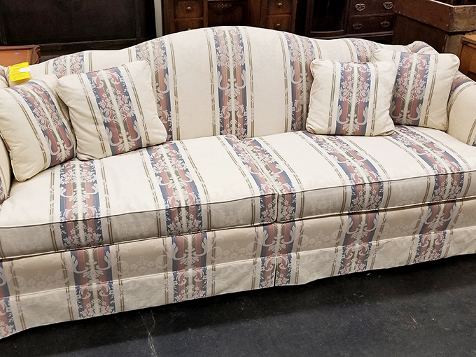 This sofa screams "1990s formal living room" &ndash; the kind nobody was allowed to sit on except visiting clergy and first dates meeting the parents.