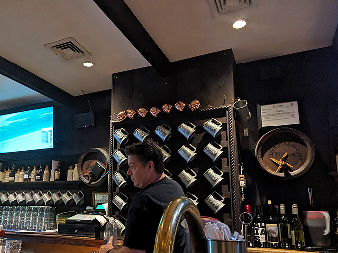 The friendly bartender represents the heart of McNally's &ndash; genuine hospitality that makes every guest feel like a welcomed regular.