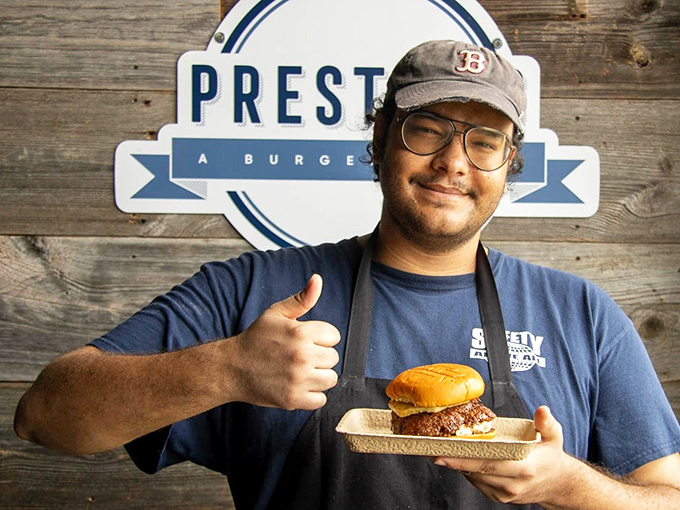 That thumbs-up isn't just for show&mdash;it's the universal symbol for "I'm about to hand you something that will change your definition of a perfect burger."